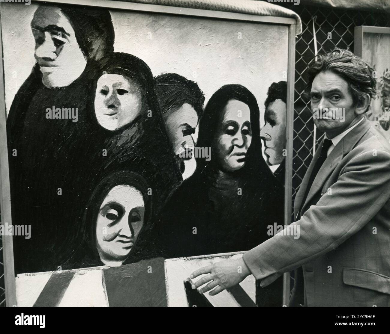 Artist Frank Manahan with his painting, 1970s Stock Photo - Alamy