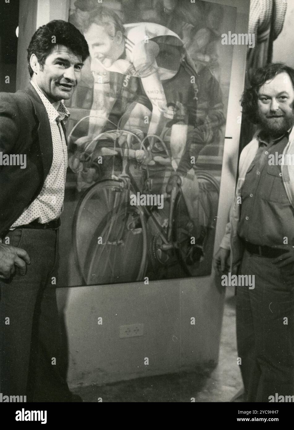 Artist Gerarld Larguier with one of his works and Raymond Poulidor ...