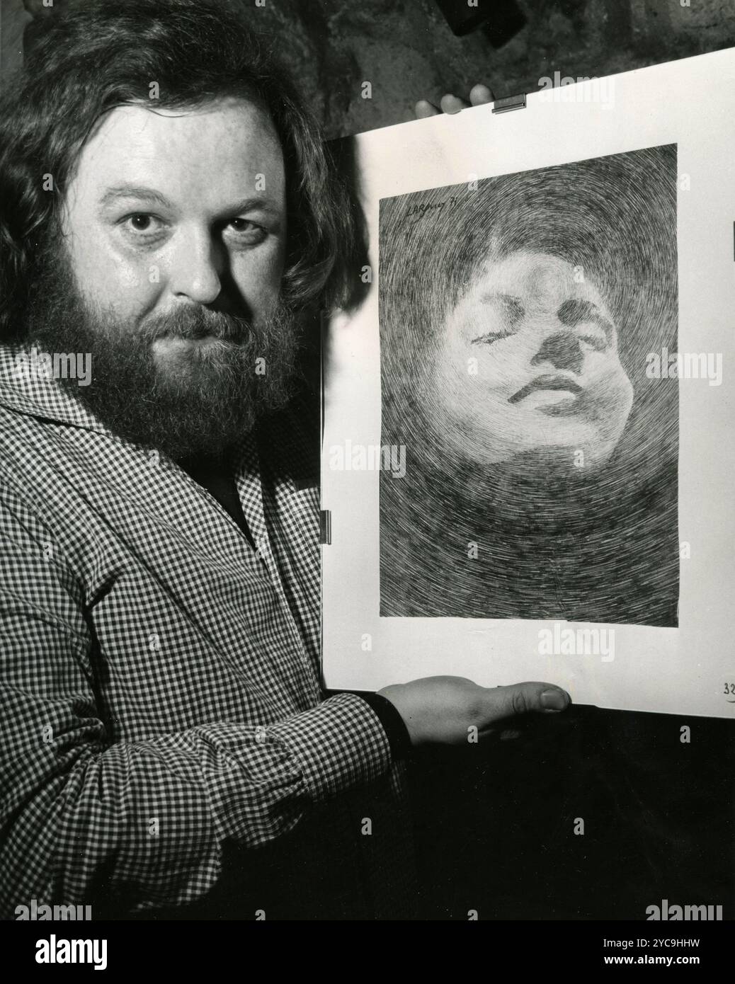 Artist Gerarld Larguier with one of his works, 1971 Stock Photo - Alamy