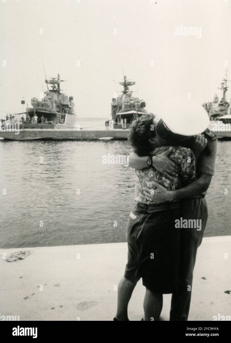 Italian sailor saying goodbye to his wife before leaving for the Gulf ...