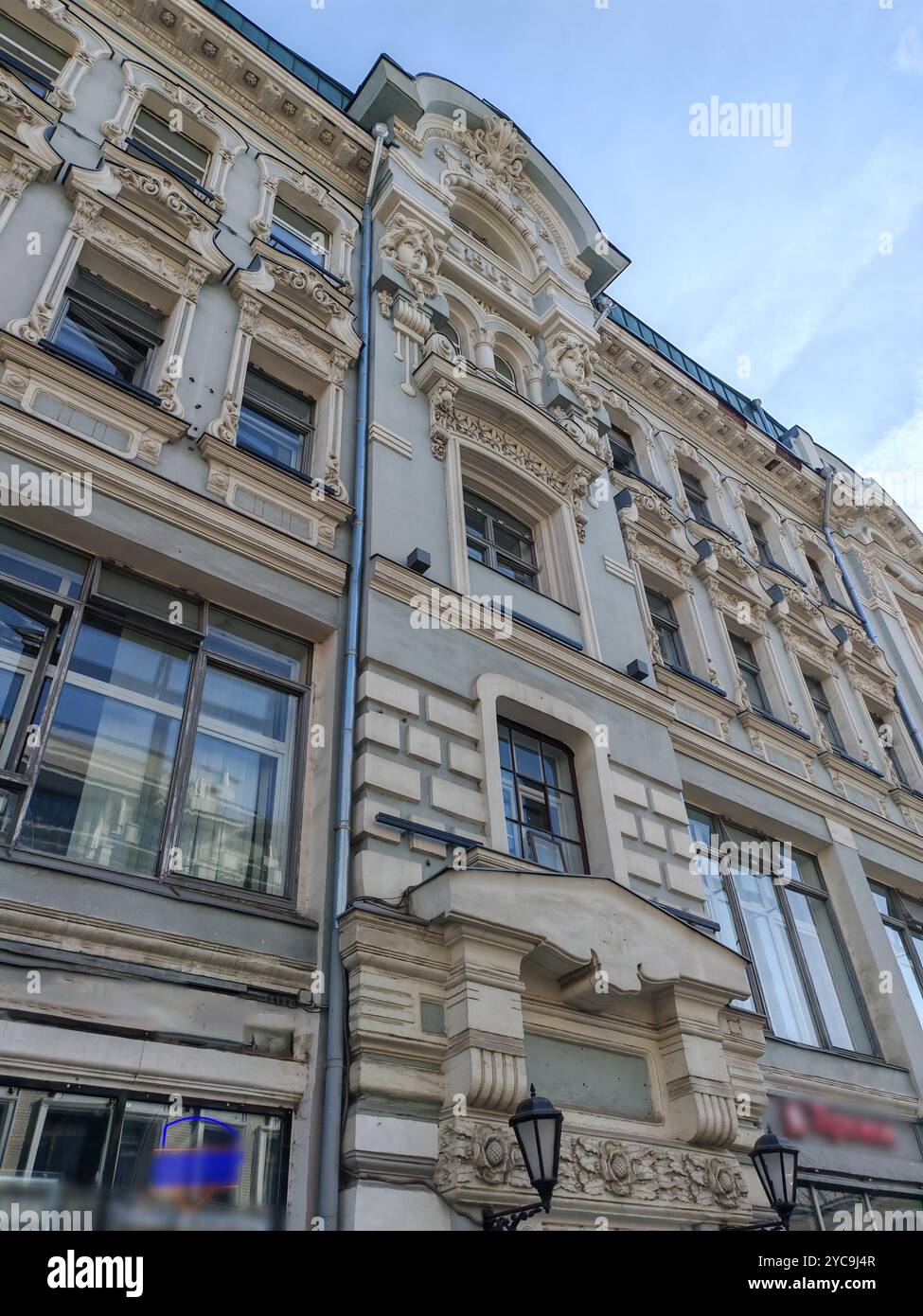 tall, elegant building with a combination of classical and modern ...