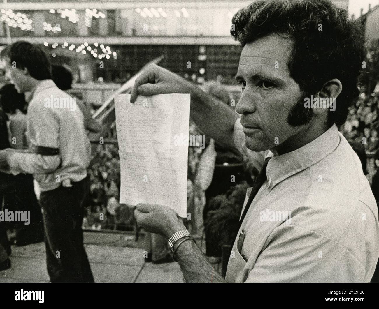 American Don Luce revealing a contract for tigercages in Vietnam ...