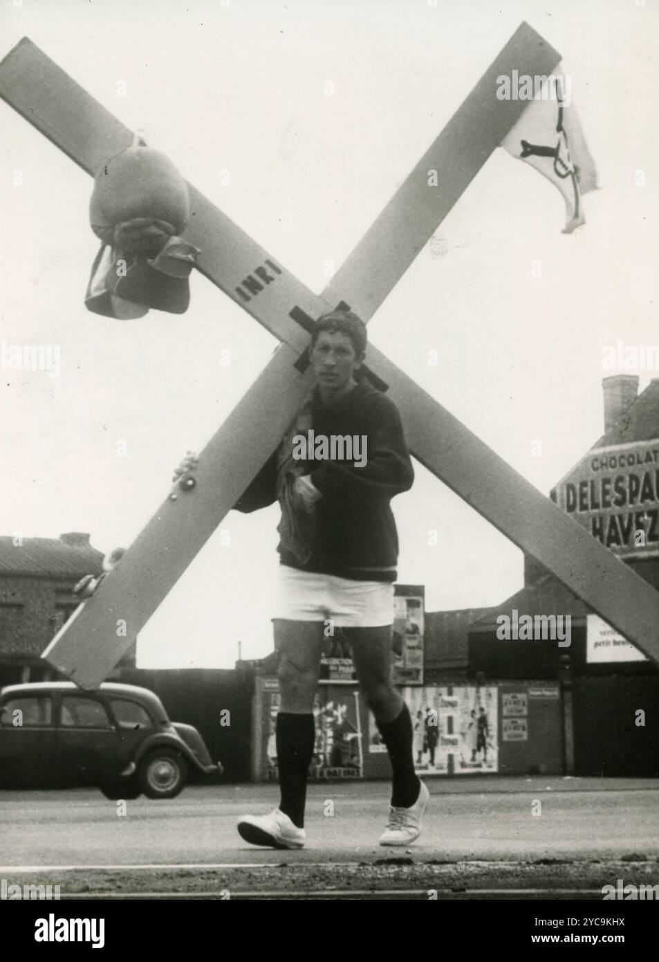 Jugoslav student Drago Vrobota, as a pilgrim with a heavy cross on his ...