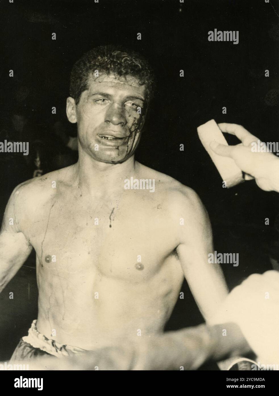 Italian professional boxer Mario Vecchiatto after a match, 1960s Stock ...
