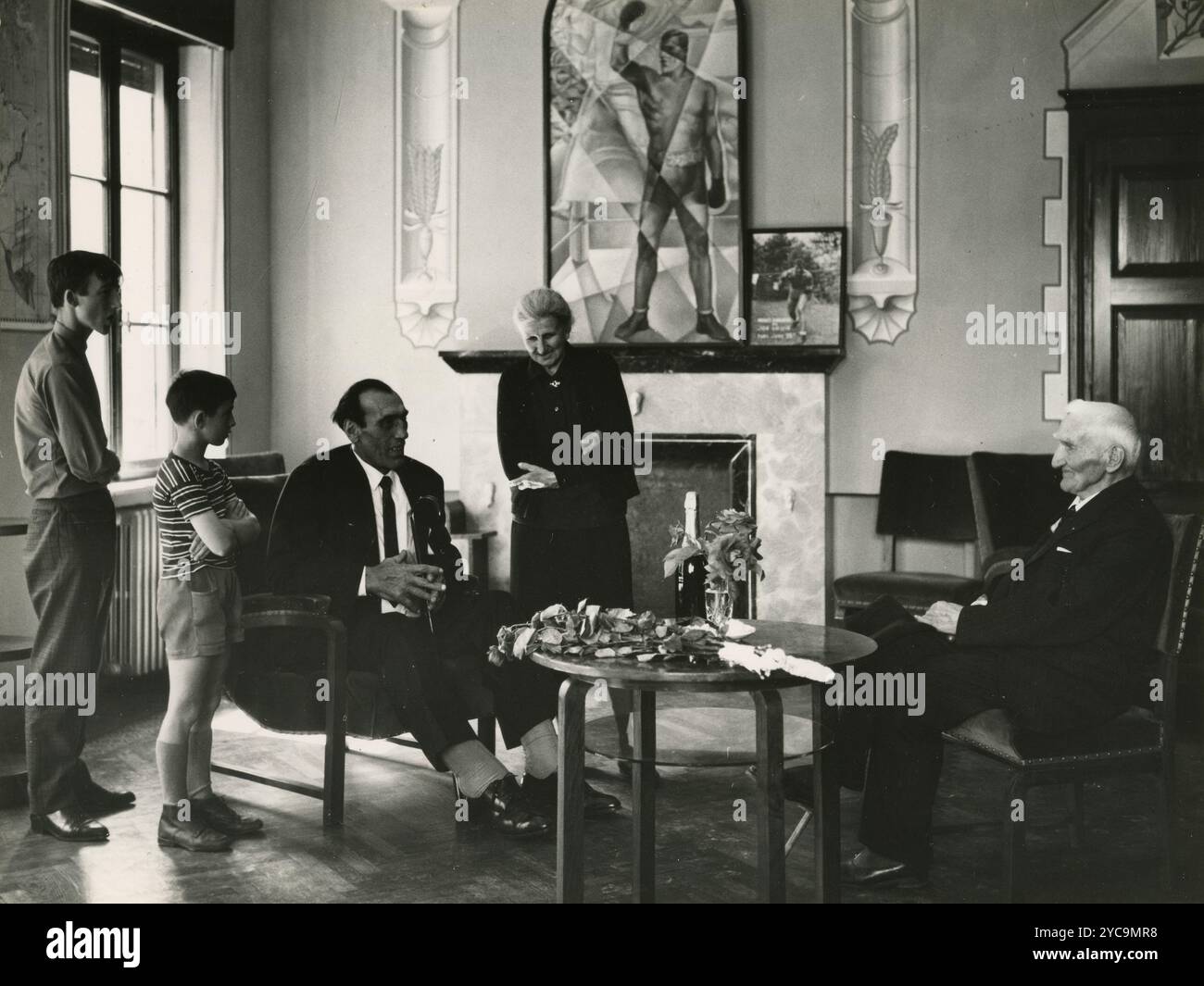 Italian professional boxer Primo Carnera visiting his parents at ...