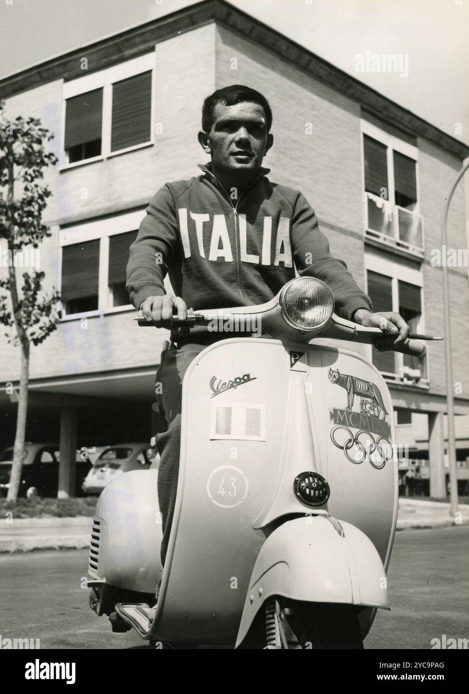Italian professional boxer Primo Zamparini in a Vespa scooter, 1960 ...