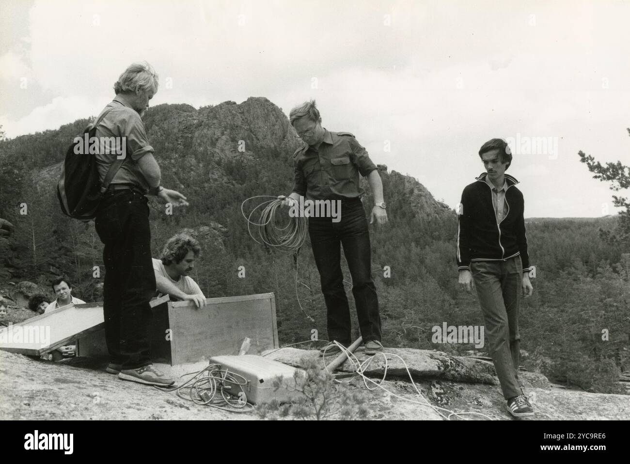 American and Russian experts installing devices during a nuclear test ...