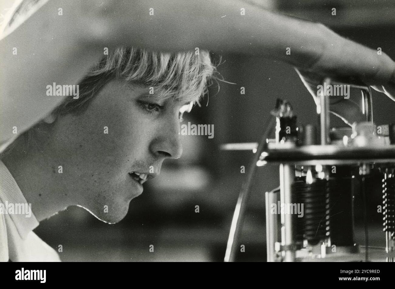 Technician regulating electronic seismic monitors, Kazakhstan 1986 ...
