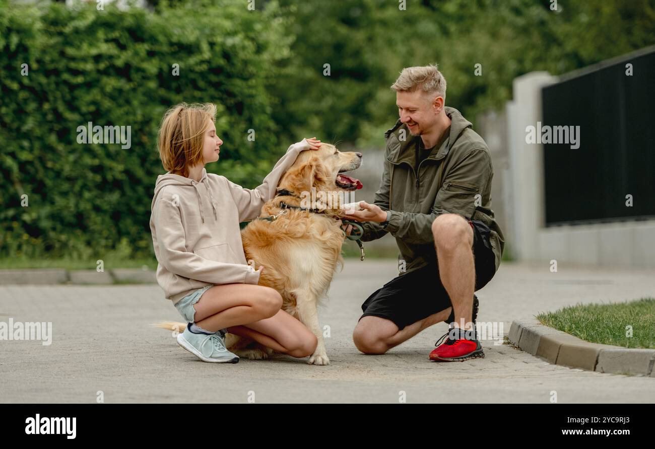 Golden Retriever Gives Paw To Owner Who, With Daughter, Went For A ...
