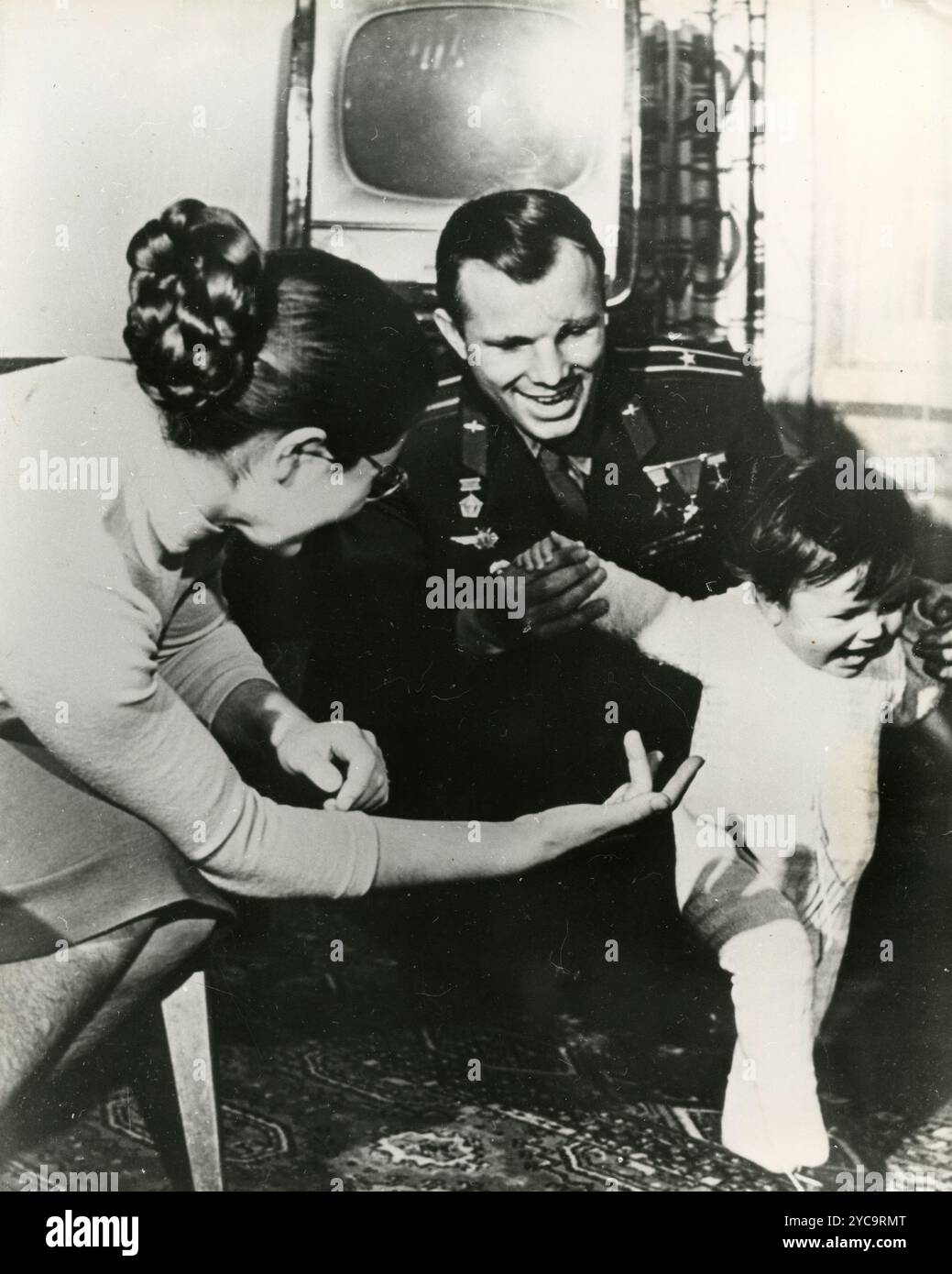 Russian cosmonaut Jurij Gagarin at home with his daughter Galya and his ...