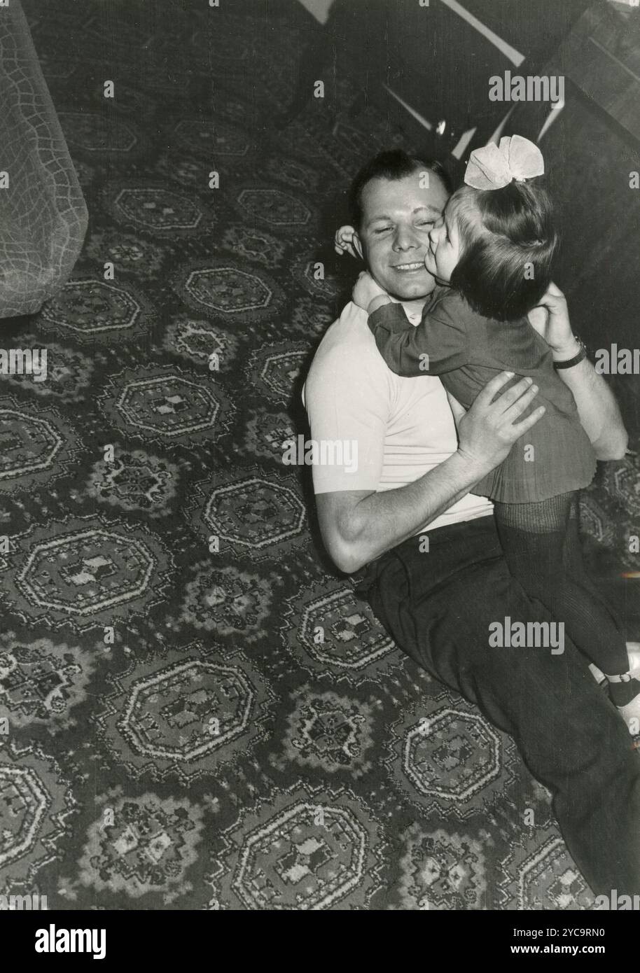 Russian cosmonaut Jurij Gagarin playing with his daughter Galya, Russia ...