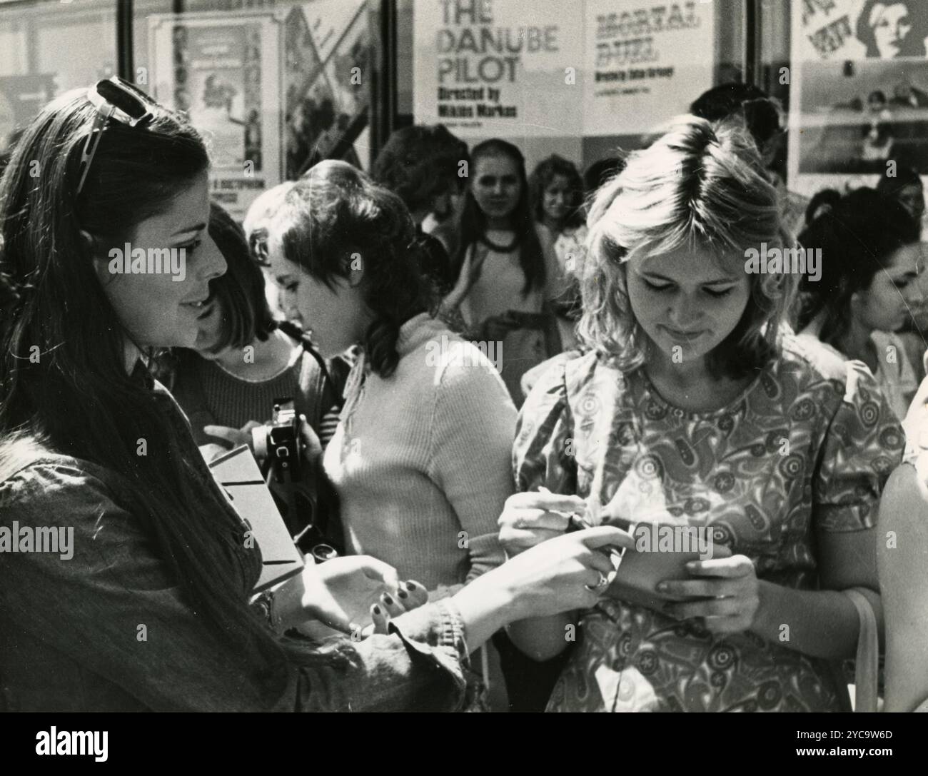 Czeck actress Andrea Cunderlikova (left) signing autograph, Russia ...