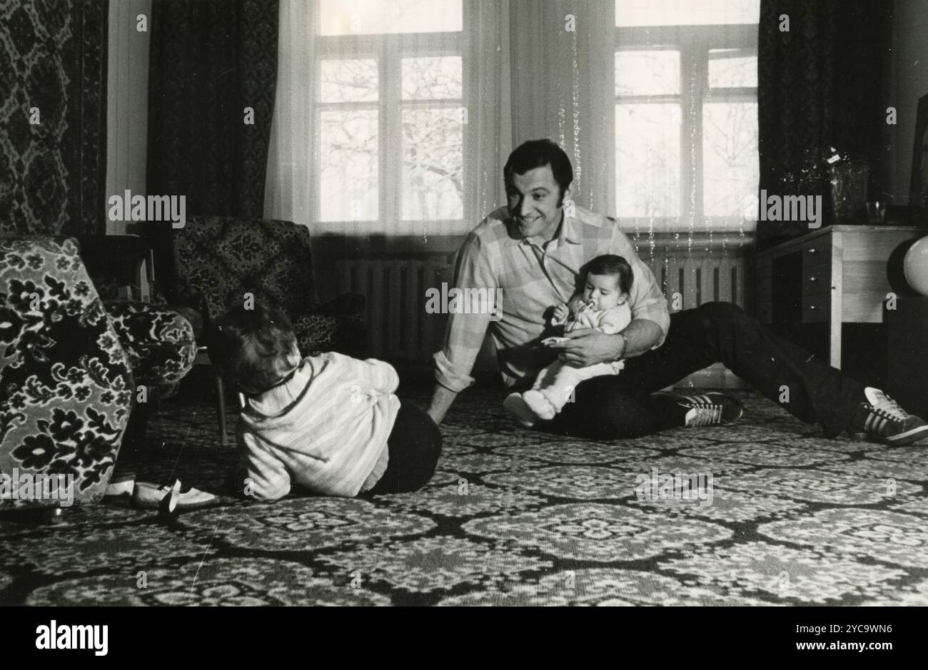 Freestyle professional wrestler Soslan Andiev with his family, Russia ...