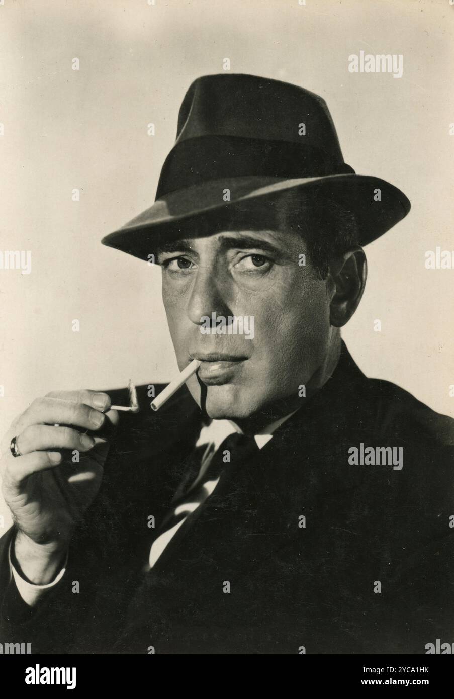 American actor Humphrey Bogart lighting a cigarette, USA 1920s Stock ...
