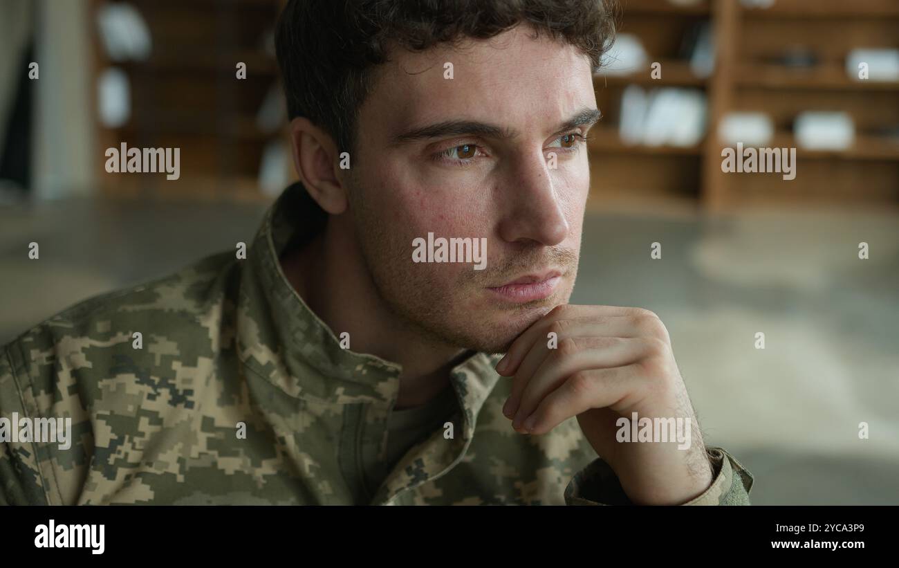 Moving blurred shot worried Caucasian male officer camouflage uniform ...