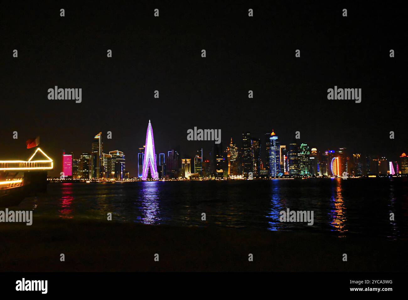 Stunning night cityscape of Doha, Qatar, where the city lights ...