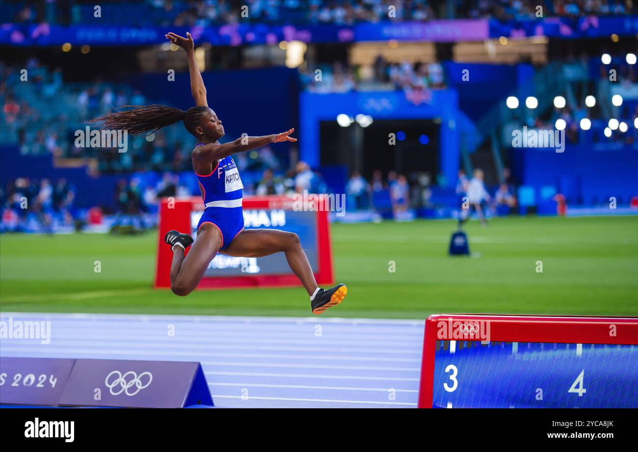 Hilary Kpatcha participating in the long jump at the Paris 2024 Olympic ...
