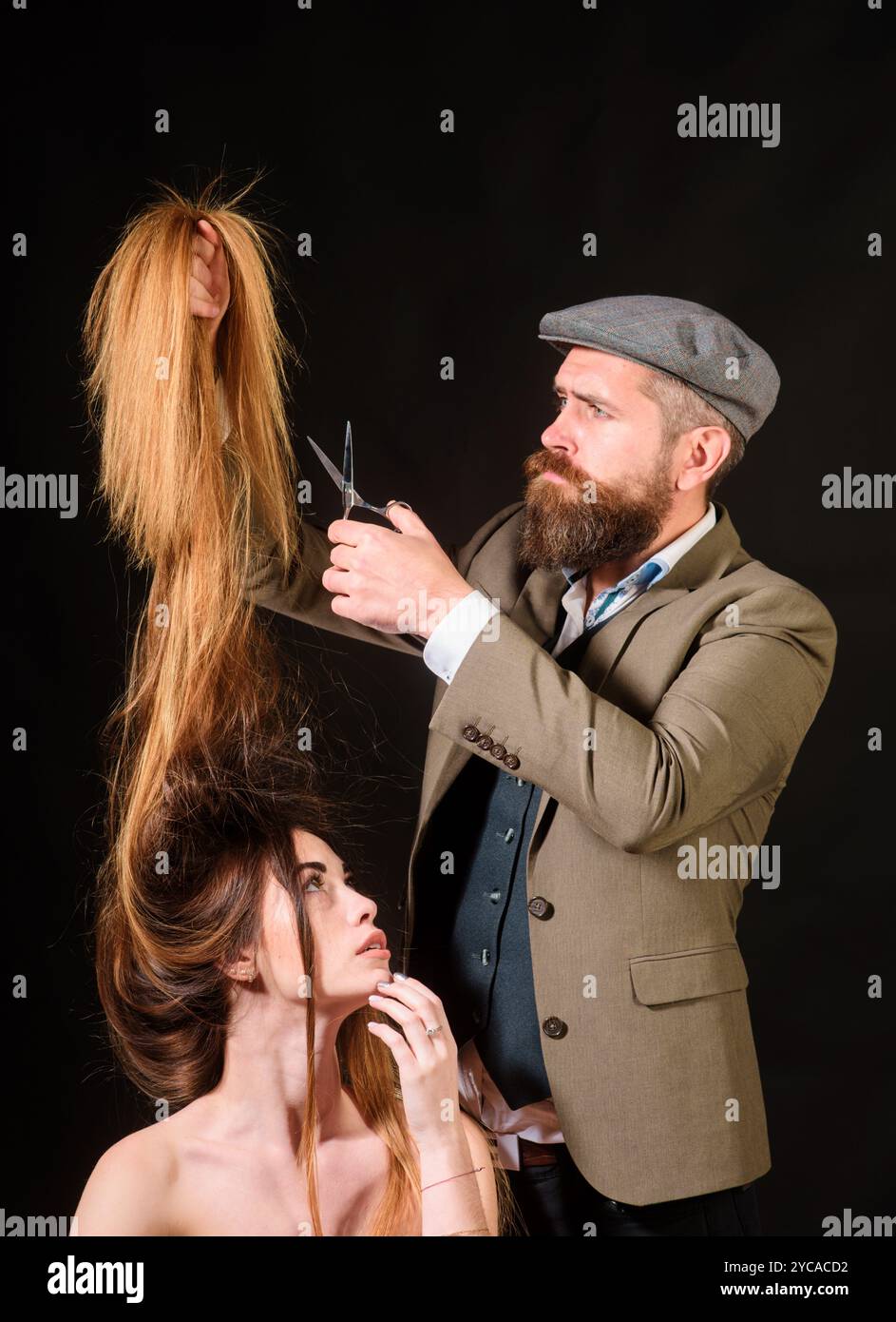 Barber scissors. Woman getting haircut by hairdresser. Woman visiting ...
