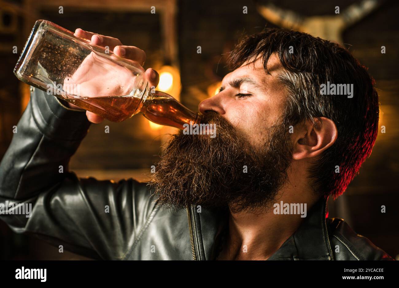 Man drinking alcohol. Whisky, brandy or cognac concept. Serious sad man ...