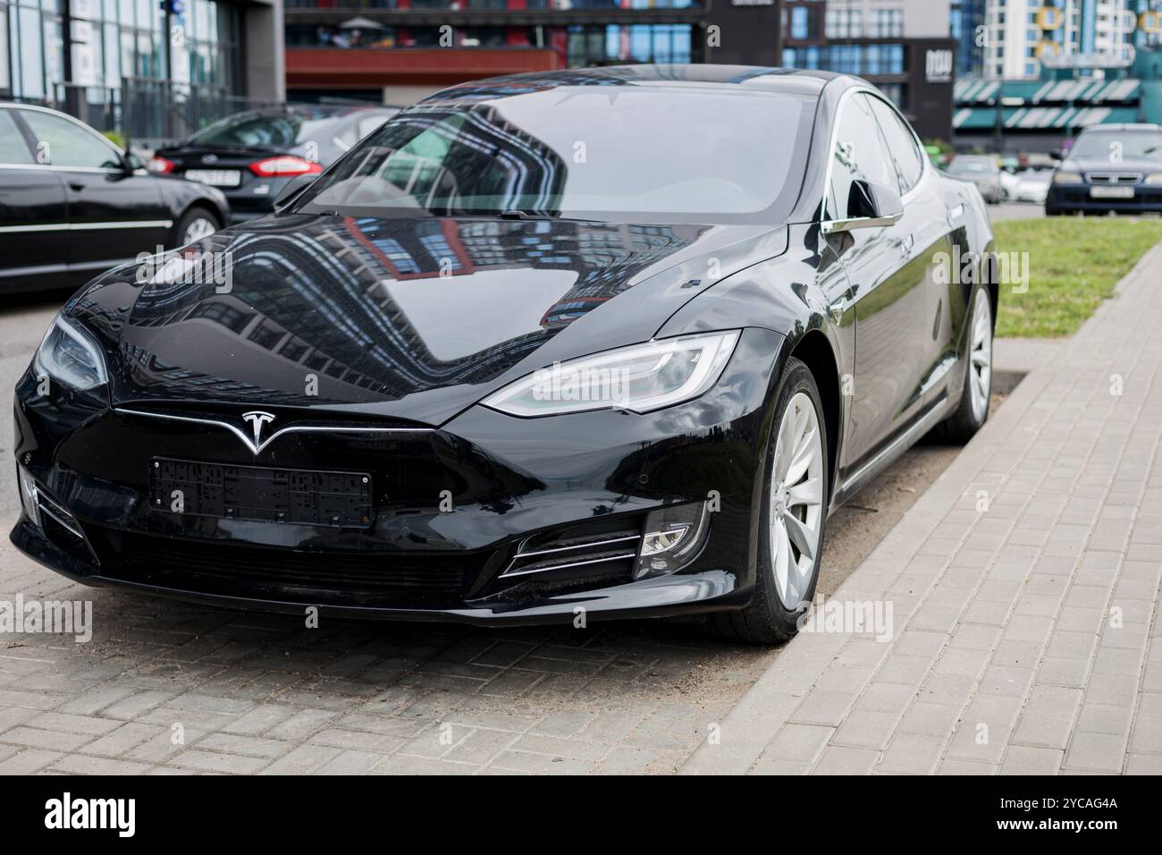 Front view tesla car driving hi-res stock photography and images - Alamy