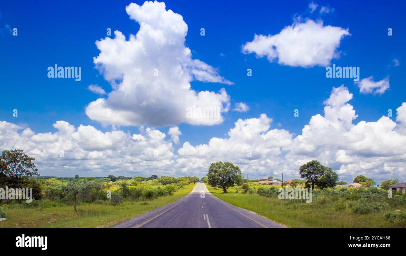 Wide road leading into South African countryside landscape Stock Photo ...