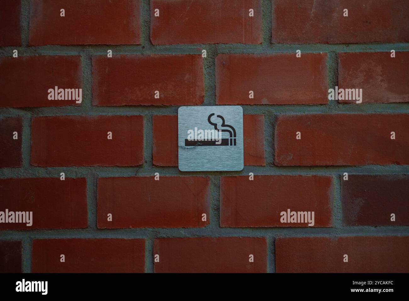 Smoking area zone. Smoking corner outdoors between office buildings ...