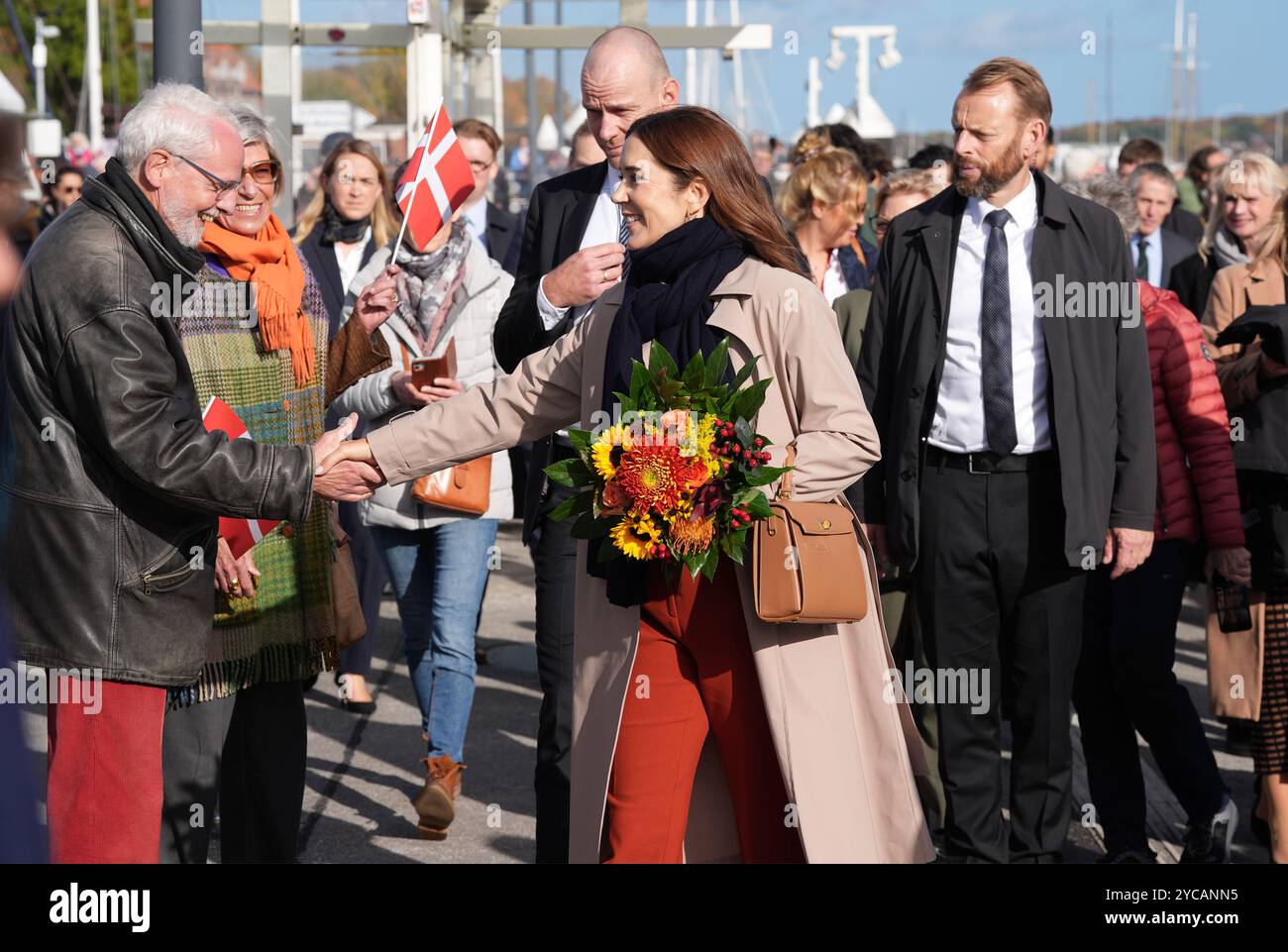 Kiel, Germany. 22nd Oct, 2024. Queen Mary (M) of Denmark walks to the ...