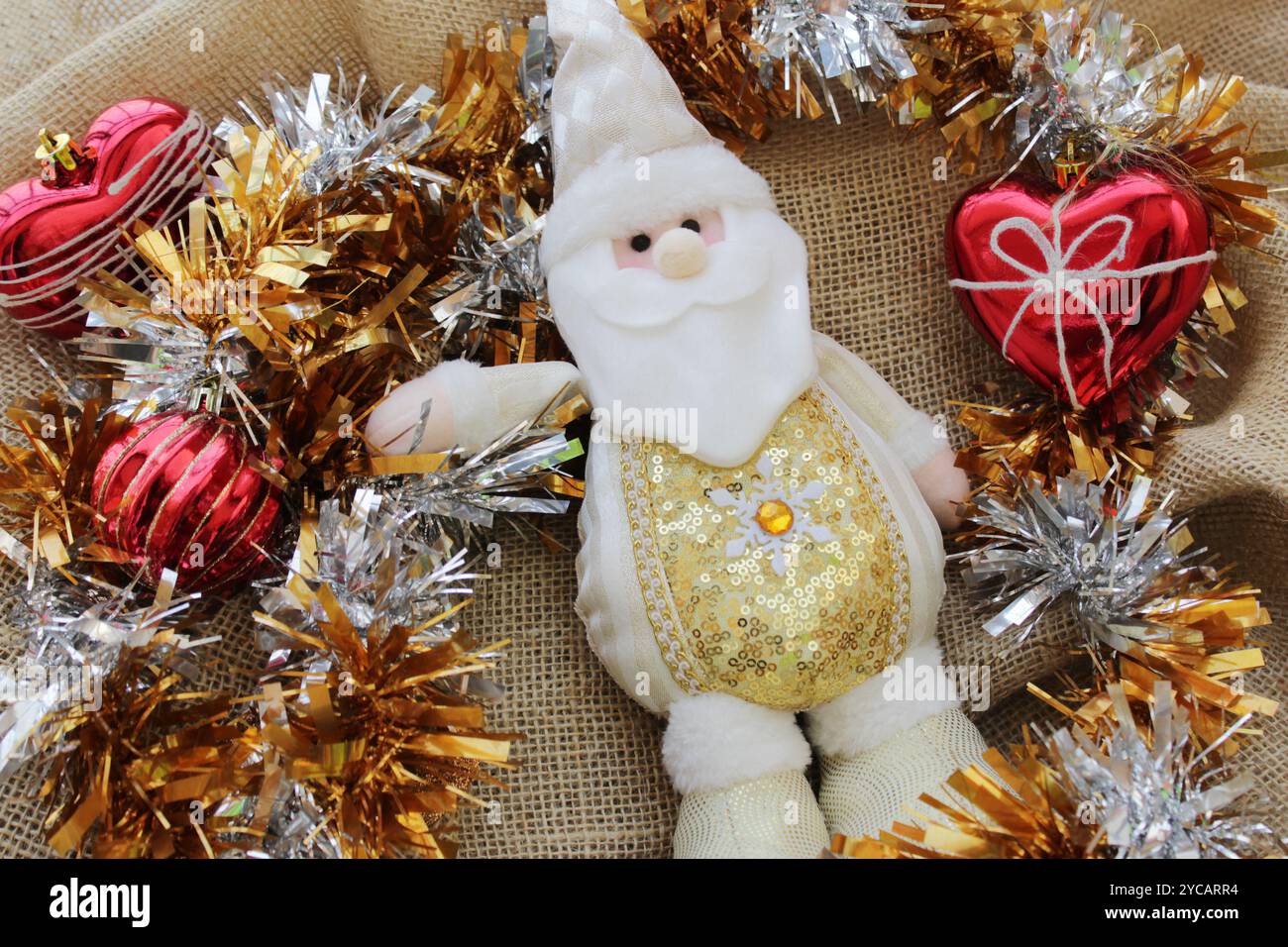 Santa Claus wearing white and golden outfit for Christmas holiday ...