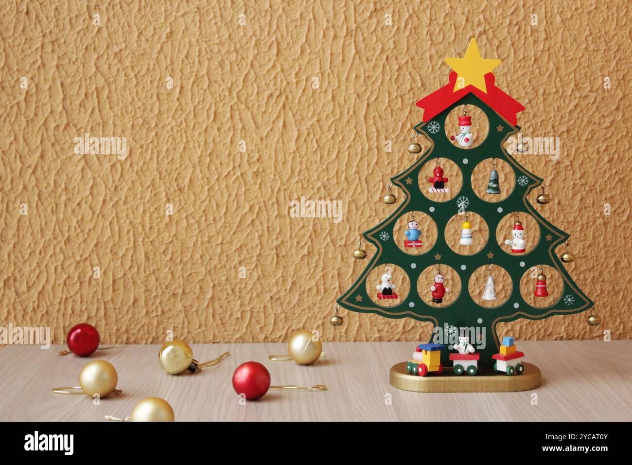 Christmas tree decorated with baubles and x-mas balls in front of ...