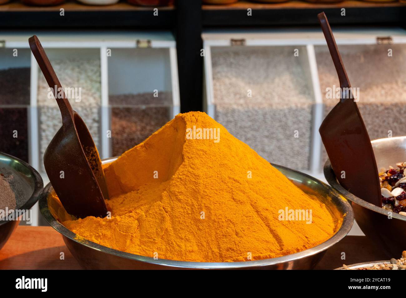 Freshly ground turmeric spice for sale in an outdoor food market in ...