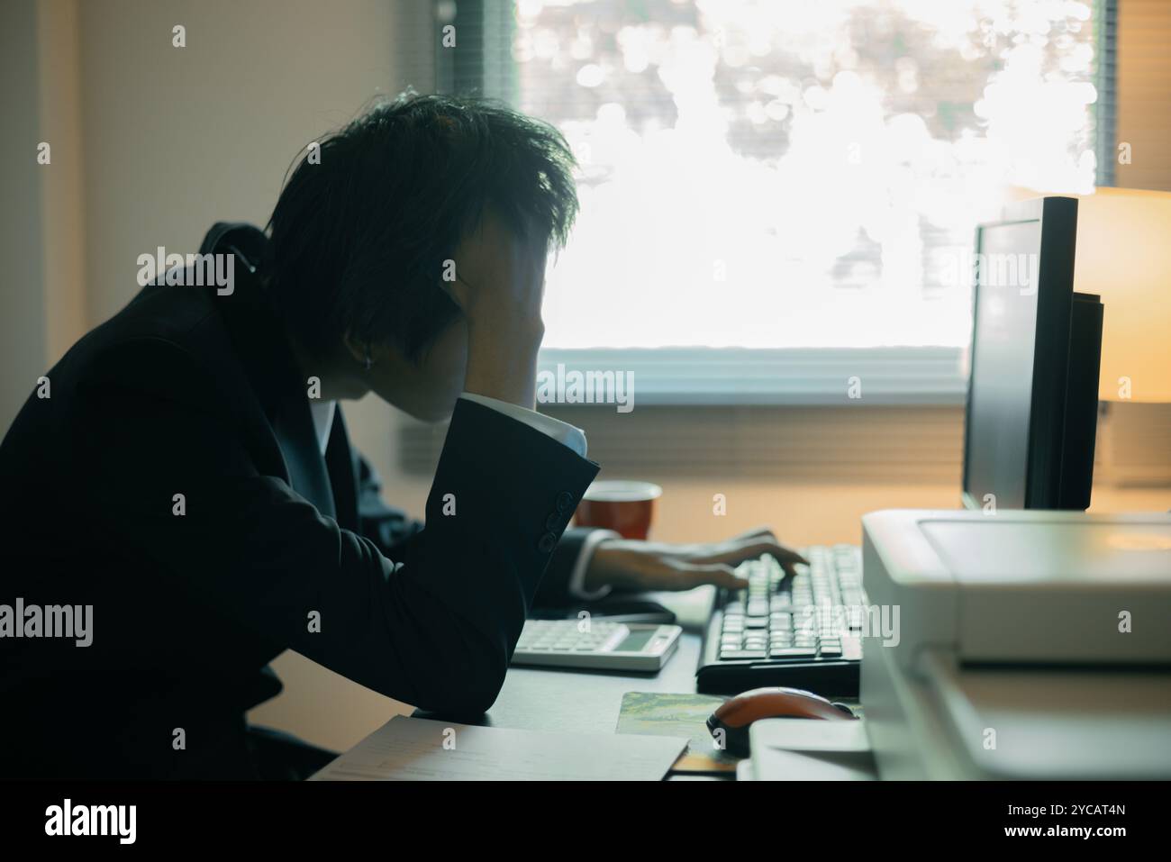 Stressed businessman, sleepy man working in his office, sat at his ...