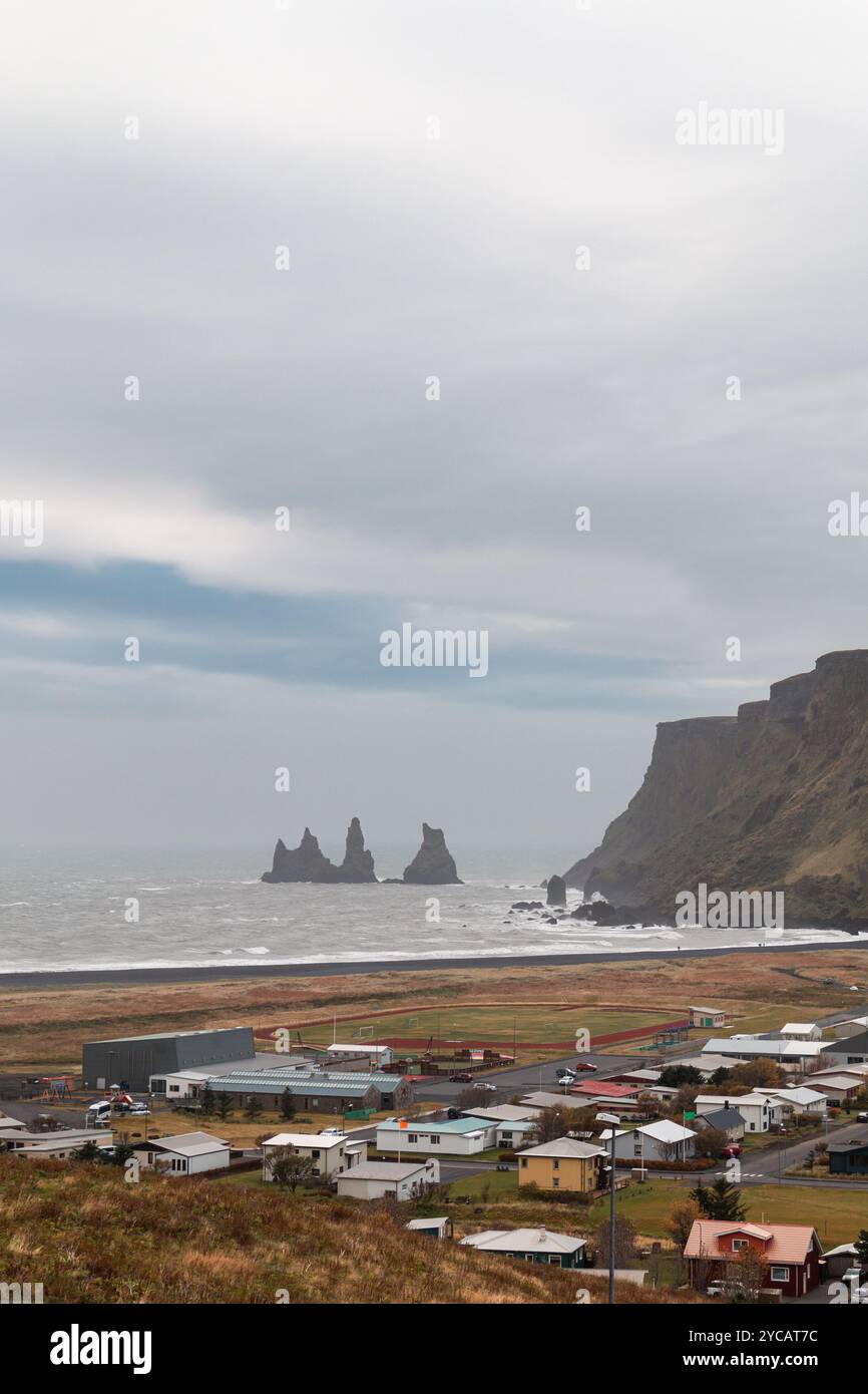 View from Vik village towards Reynisdrangar basalt sea stacks on the ...