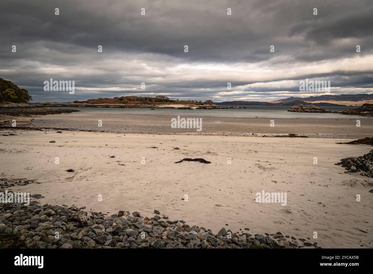 A cloudy, autumnal HDR image of an empty Samalaman Bay with Samalaman Island in the background ...