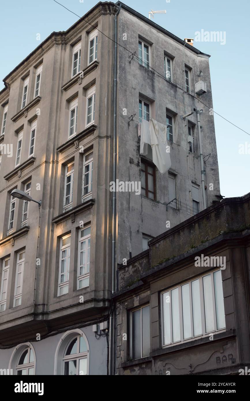 Sheets hanging in the sun in an old neglected building in the Galician ...