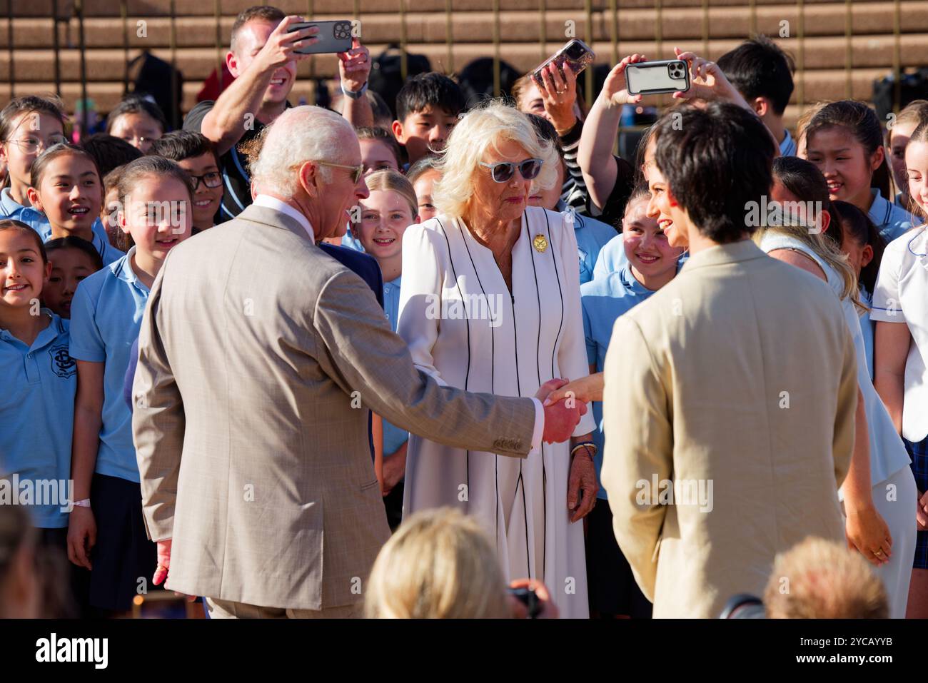 King Charles III shakes hands during Queen Camilla and King Charles III visit to the Sydney ...