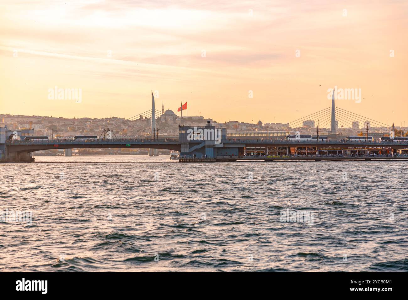 Istanbul, Turkiye - OCT 8, 2024: The Galata Bridge that connects two ...