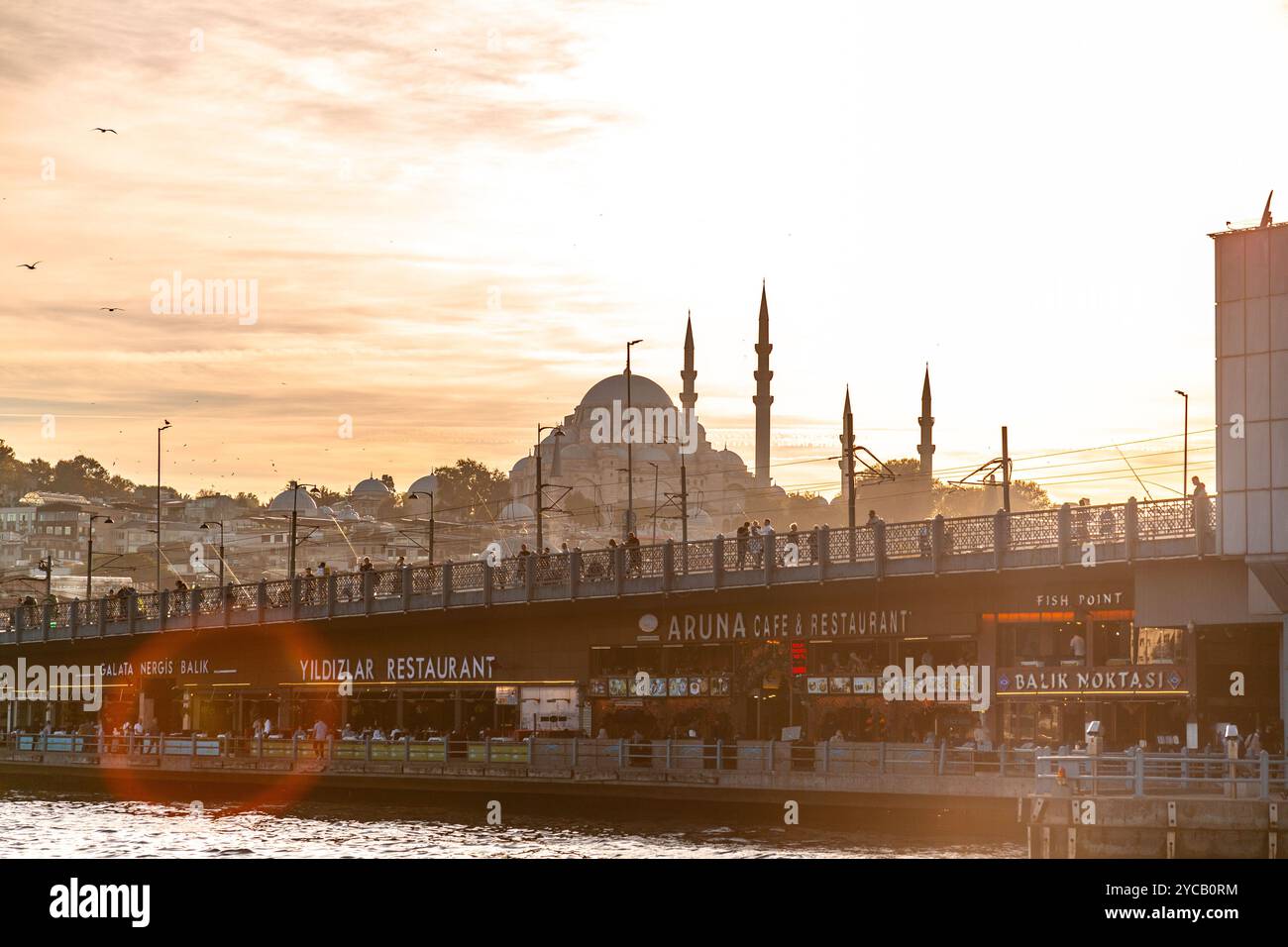 Istanbul, Turkiye - OCT 8, 2024: The Galata Bridge that connects two ...