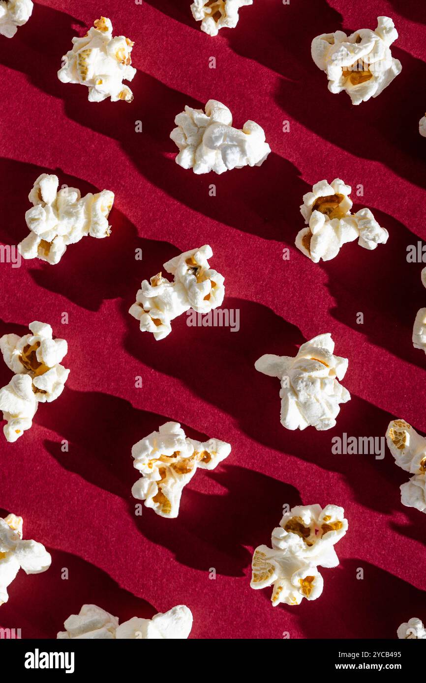 A playful, nostalgia-inducing pattern of popped popcorn scattered on a ...