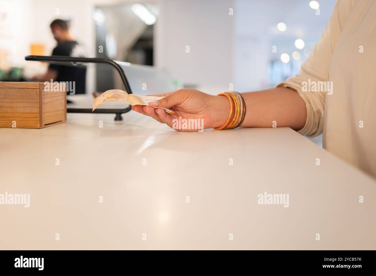 Woman passes currency exchange hi-res stock photography and images - Alamy