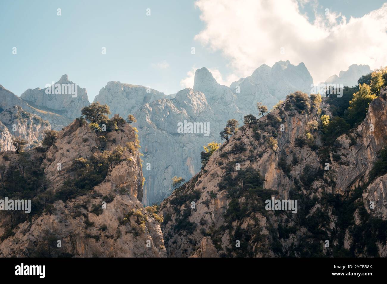 Majestic cliff faces and rugged peaks define the landscape of the Cares ...