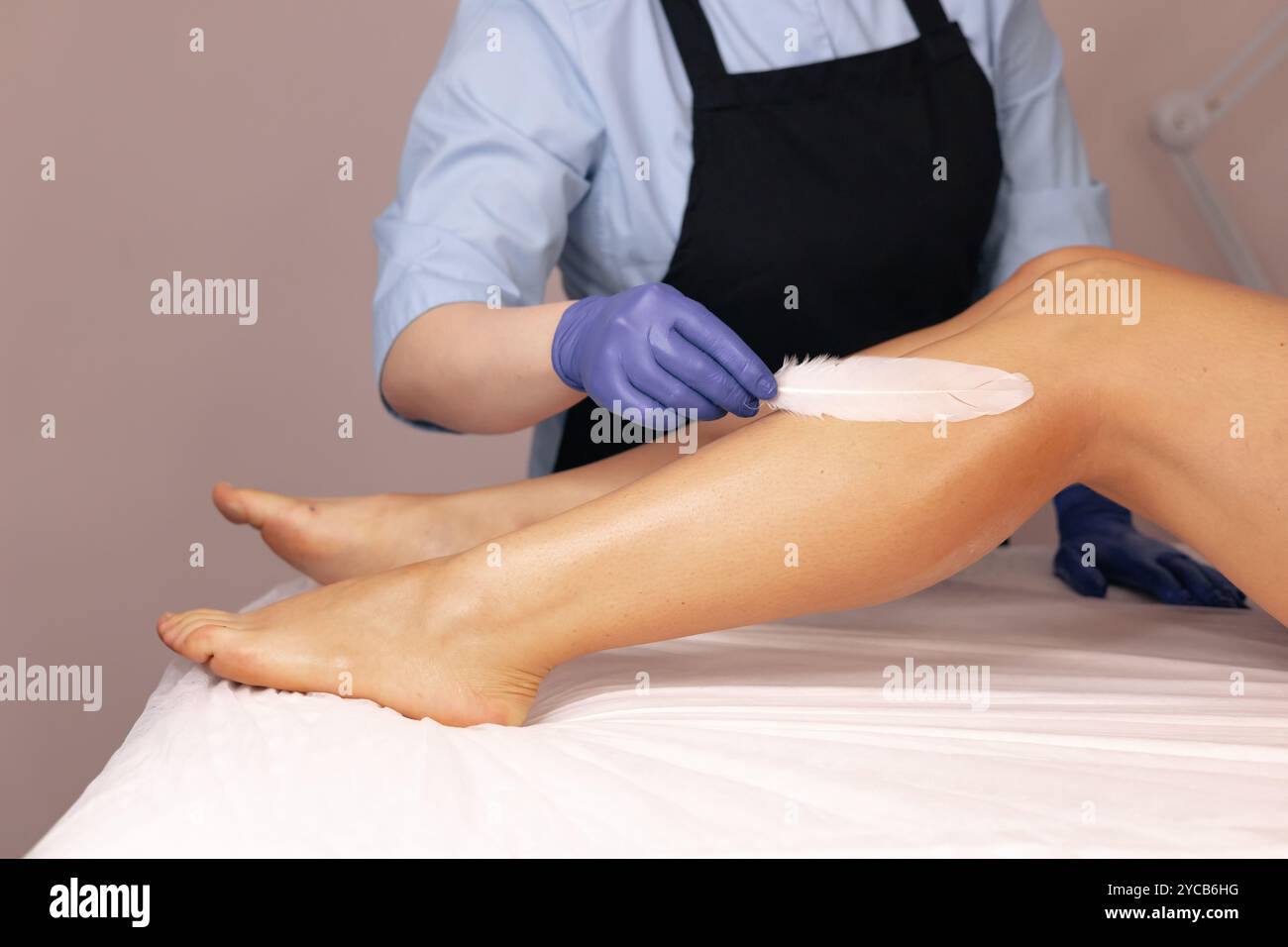 Aesthetic leg waxing process with gentle techniques in a tranquil ...
