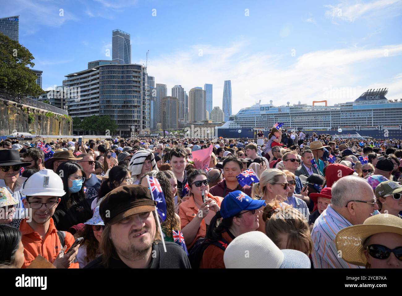 Thousands of people are seen waiting in front of the Opera House to ...