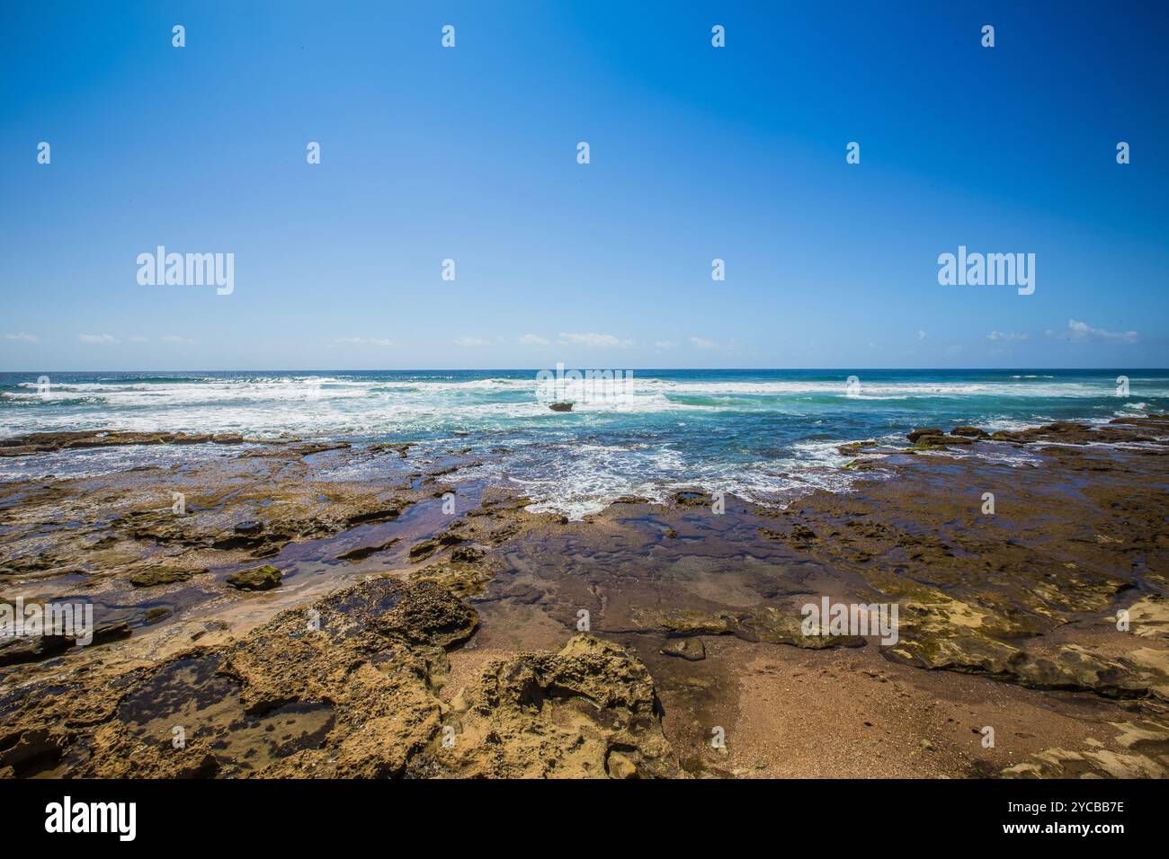 Rocky shore of the Indian Ocean at Sodwana Bay, South Africa Stock ...
