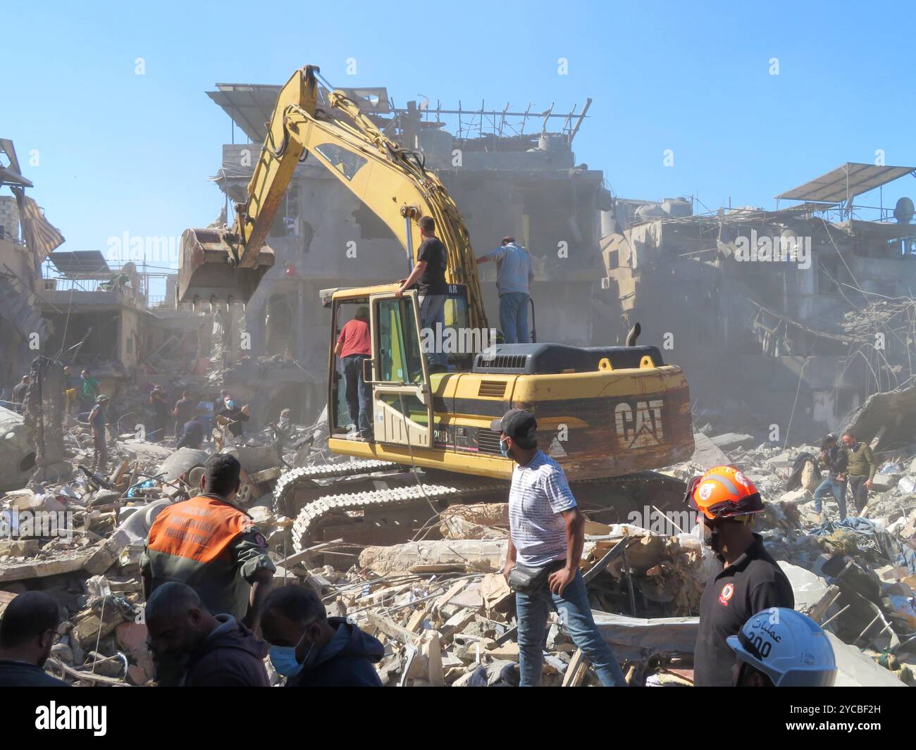 Rescuers at work in Jnah, near Rafic Hariri Hospital, after an Israeli ...