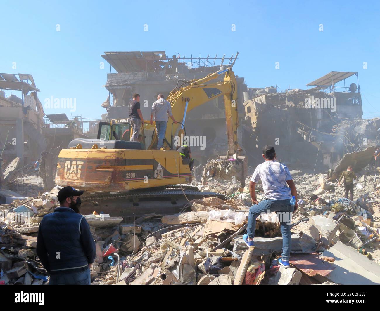 Beirut, Lebanon. 22nd Oct, 2024. Rescuers search for survivors after an ...