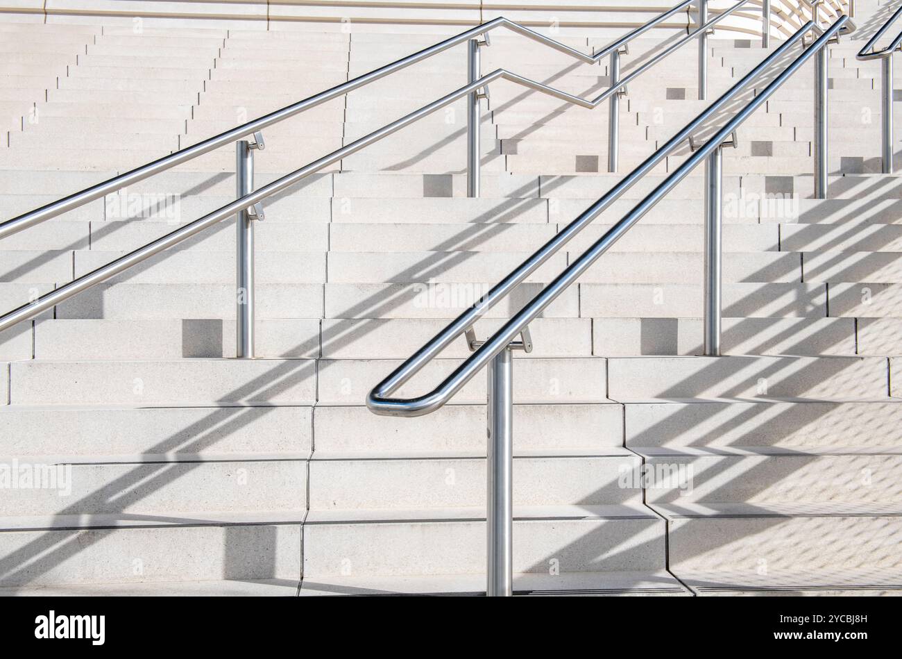 abstract image of handrails and white stone steps or stairs with ...