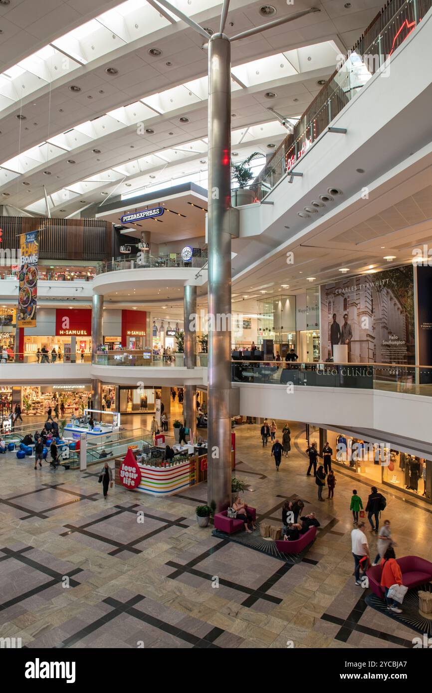 the interior of the multi-level west quay modern shopping centre in ...