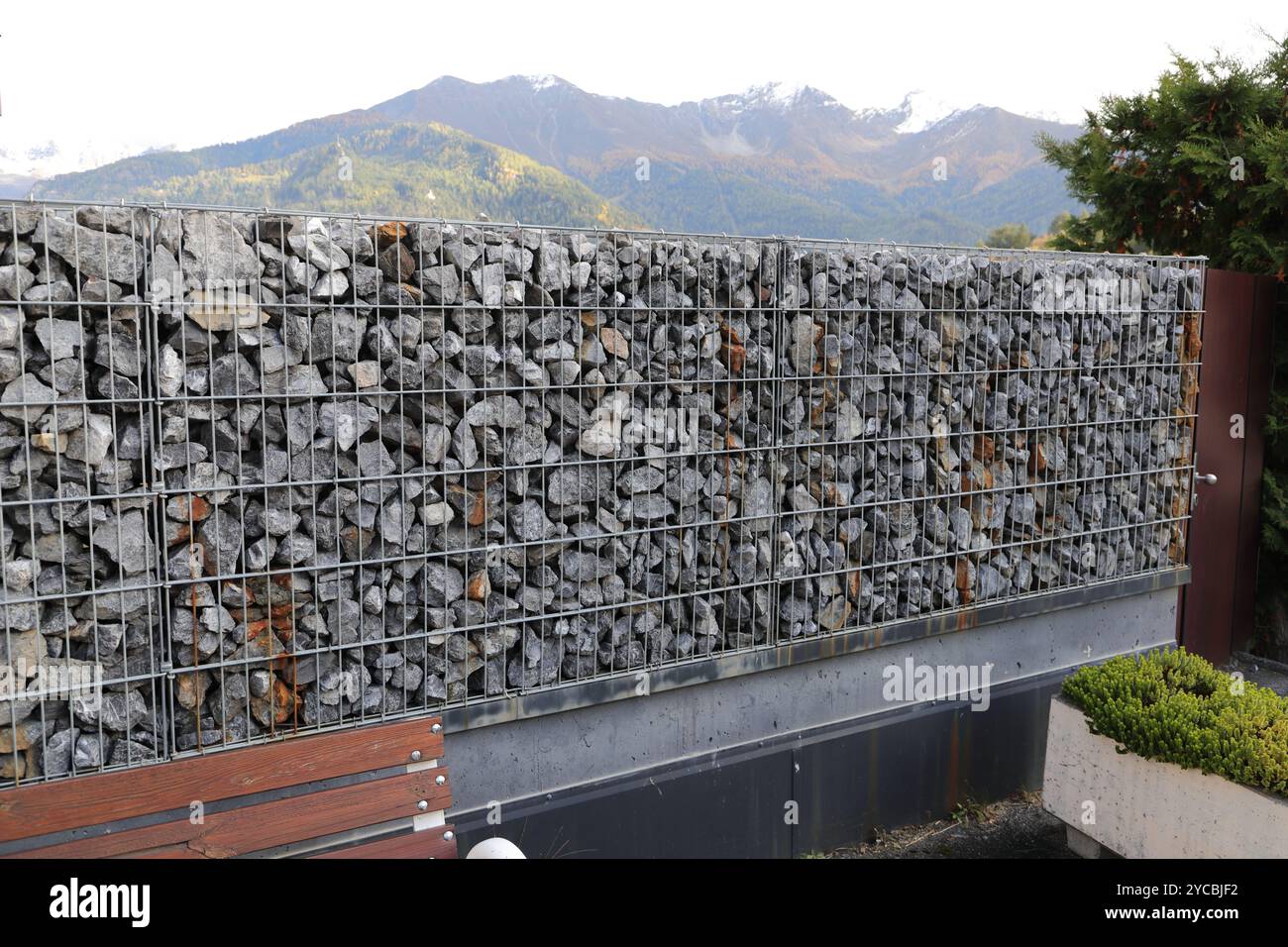 gabions with stones as visual protection Stock Photo - Alamy