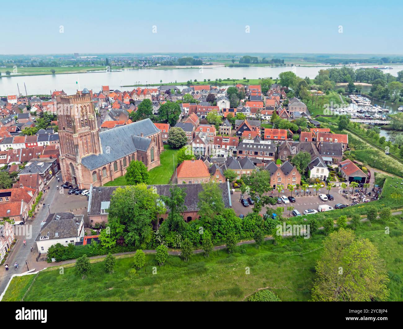 Aerial from the historical town Woudrichem at the river Merwede in the ...