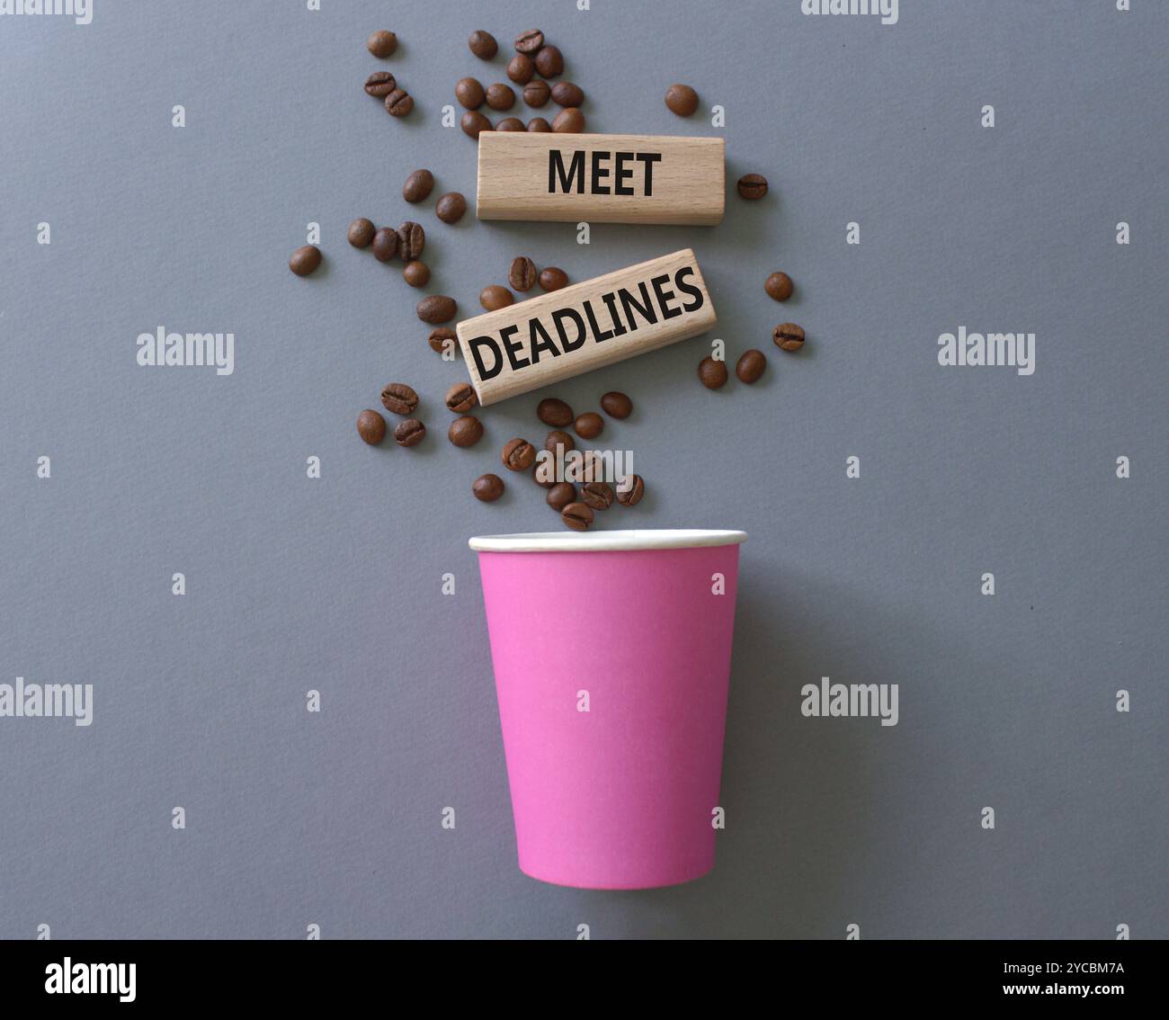 Meet Deadlines symbol. Concept word Meet Deadlines on wooden blocks ...
